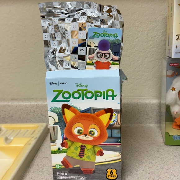 Disney | Other | Disney Zootopia Fox Figure With Green Outfit | Poshmark